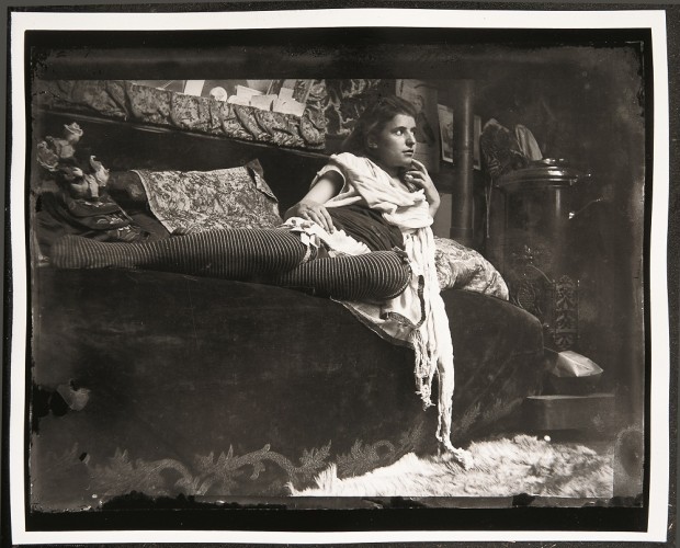 Model reclining on the couch in Mucha's studio, Rue du Val-de-Grâce ...